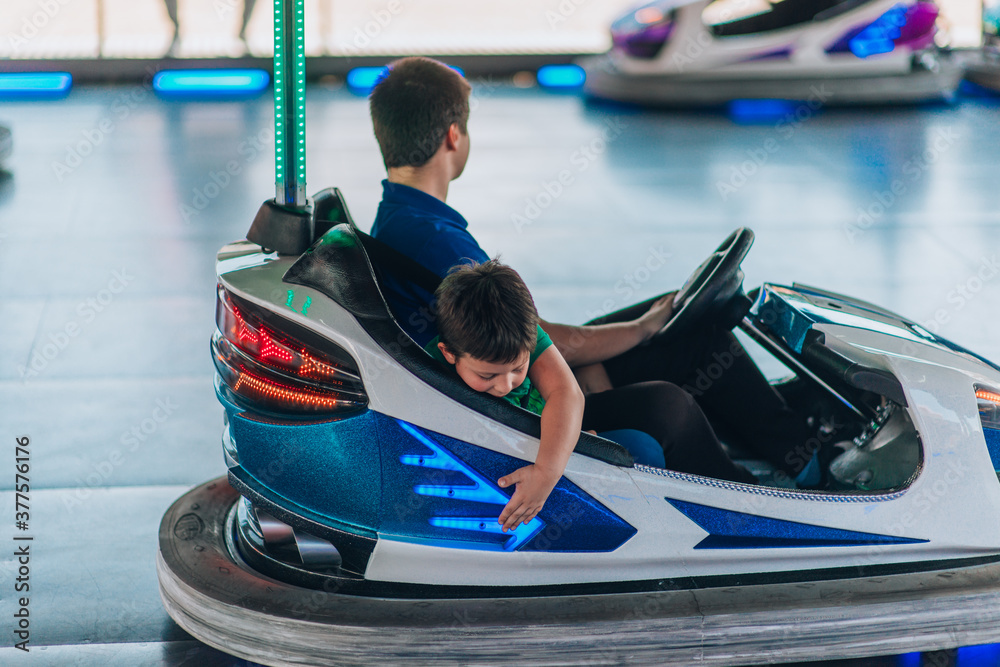 Child having fun at amusement park Stock Photo | Adobe Stock