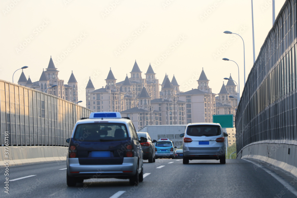 Expressway in modern city help reduce traffic jam. Driving car on the ...