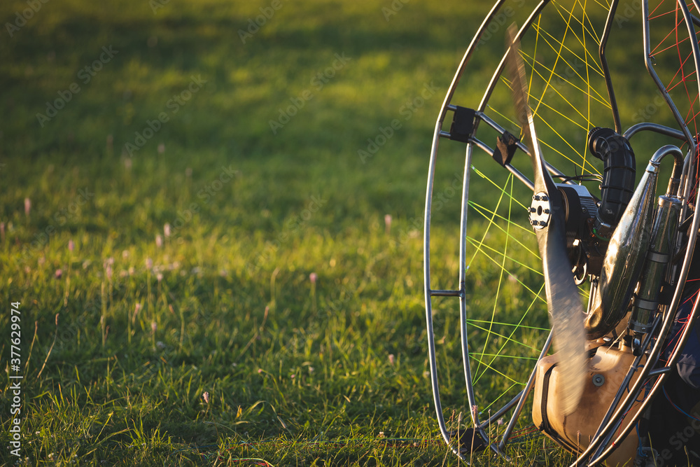 Closeup of an individual parajet backpack with a running gasoline ...
