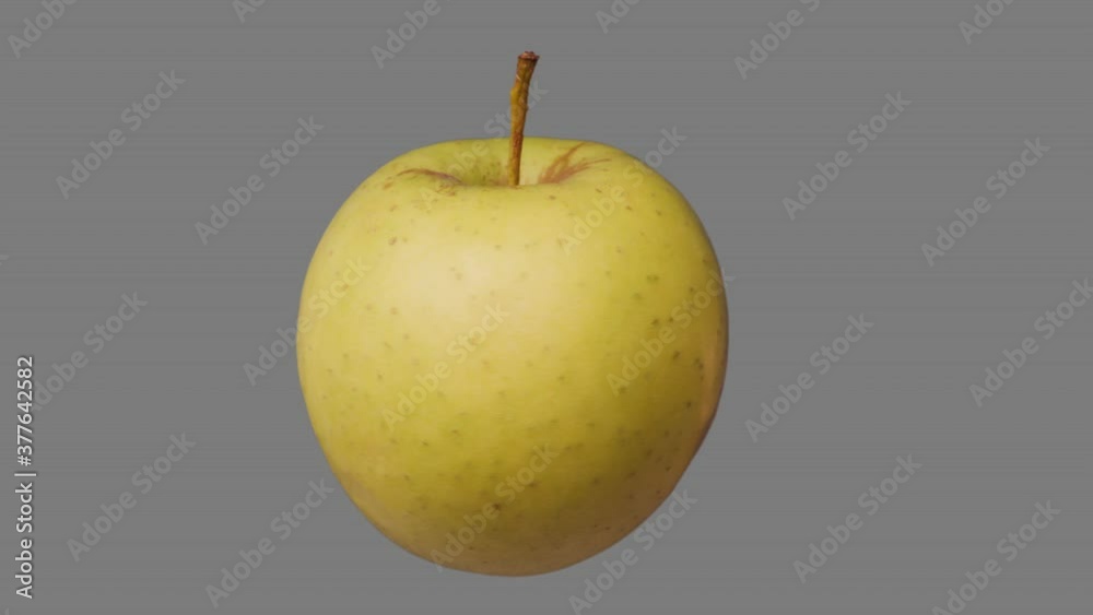 Fresh yellow apple spin and float - isolated on neutral gray. Seamless ...
