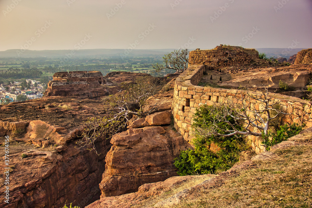 Badami landscape with rocks and historical Hindu and Jain cave temples ...
