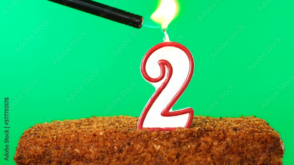 Cake with the number 2 lighted candle. Chroma key. Green Screen ...