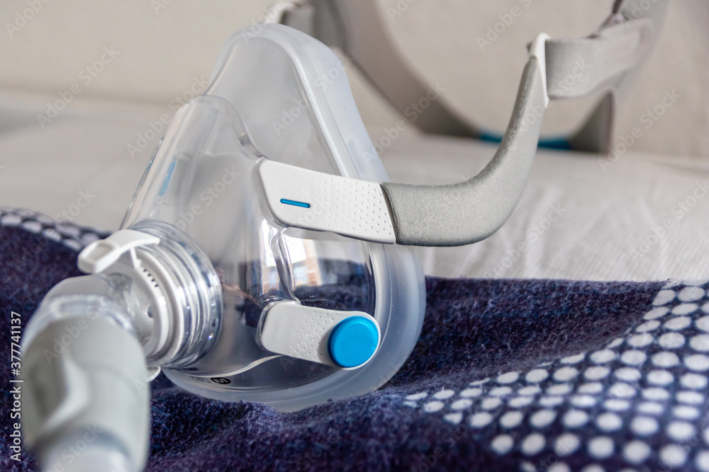 CPAP mask against obstructive sleep apnea on pillow helps patients as ...