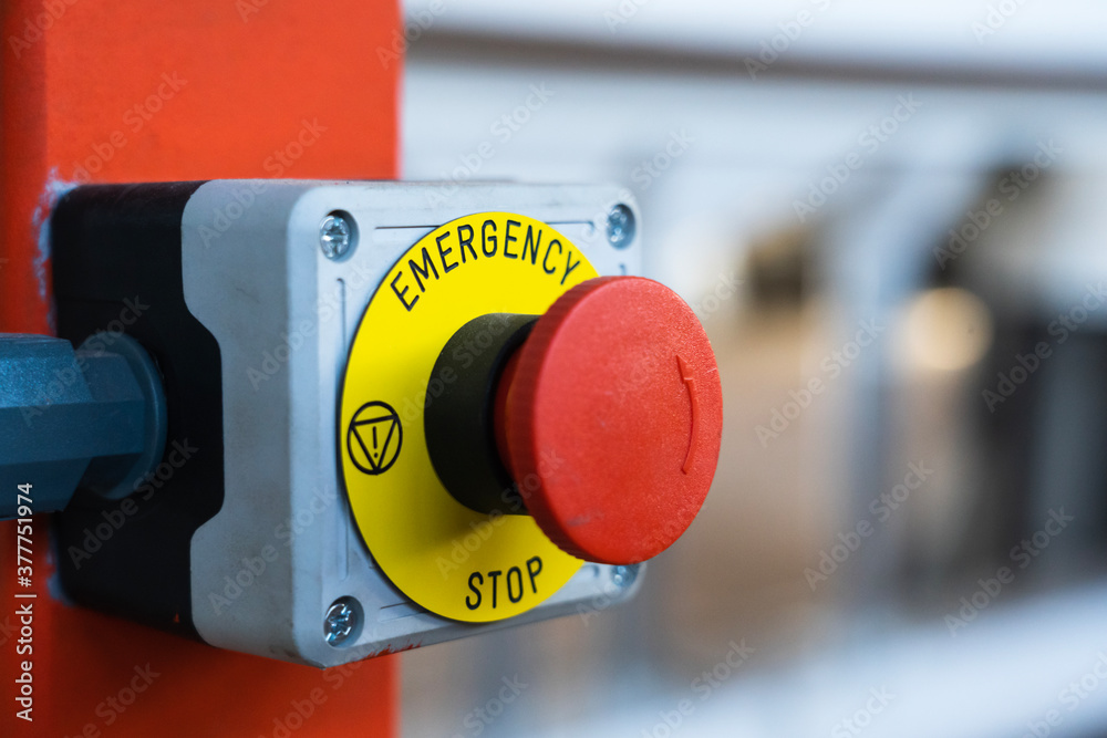 Emergency button in technical production Stock Photo | Adobe Stock