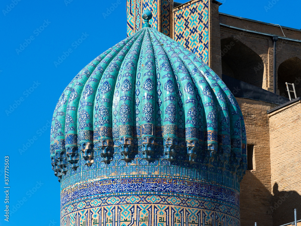 Fluted dome in turquoise color with detailed ornaments of blue ceramic ...