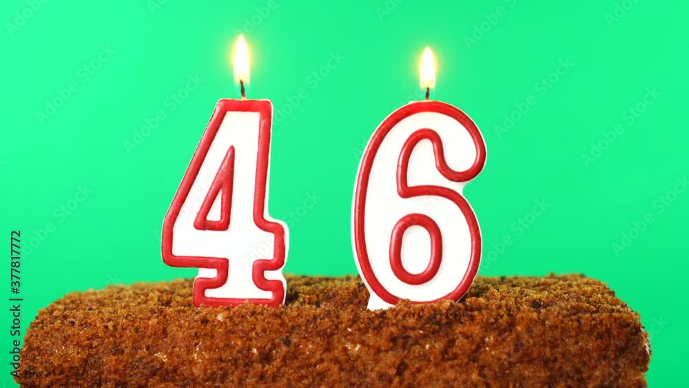Cake with the number 46 lighted candle. Chroma key. Green Screen ...