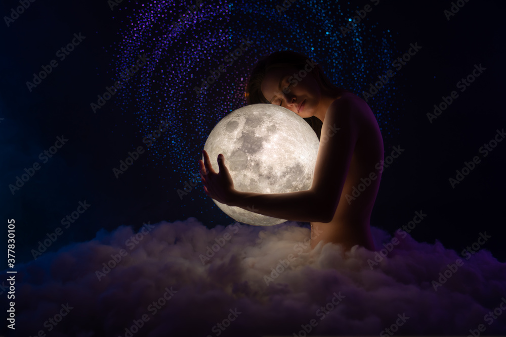 Tender Young Beautiful Naked Girl Siting On The Soft Clouds And Hugs