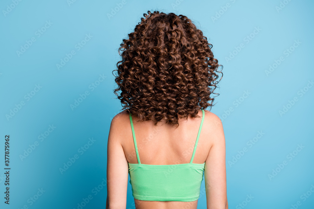 Rear back photo of young lady stand big extensive volume hairstyle nice ...