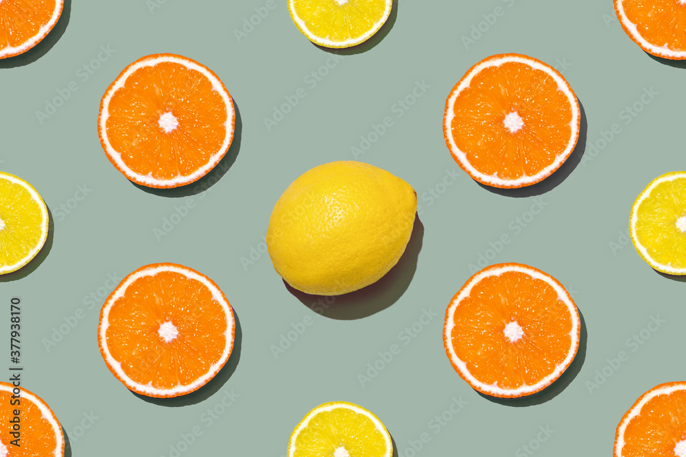 Top view of fresh lemon and orange seamless pattern on gray or olive ...