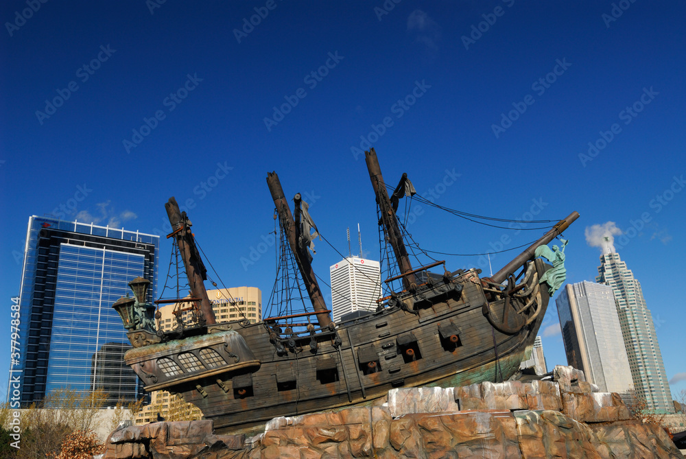 Black Pearl Pirate ship with Toronto city skyline and highrise towers ...