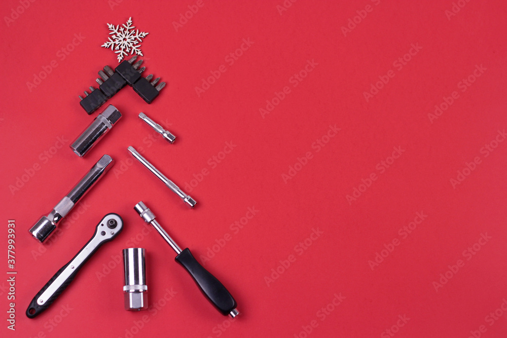 Creative christmas tree on red background, made of wrenches.Set of ...