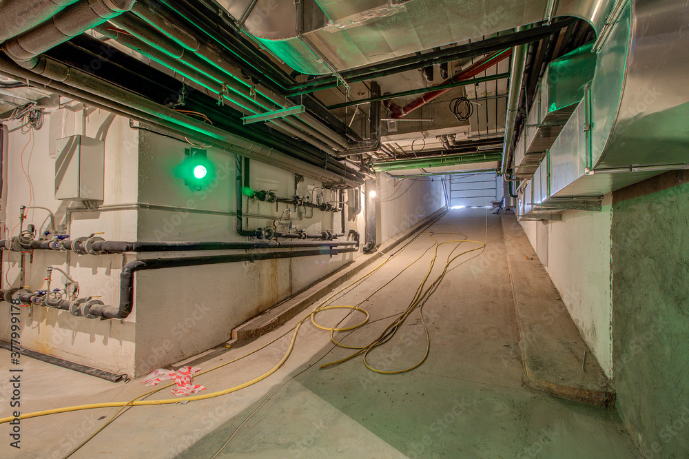 Underground parking in construction phase. Empty garage in basement of ...