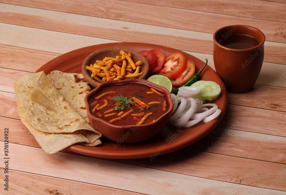 Dhaba style Sev bhaji/sabzi/curry made in tomato curry with gathiya ...