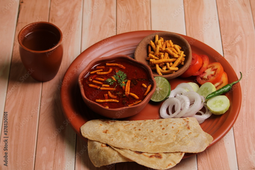 Dhaba style Sev bhaji/sabzi/curry made in tomato curry with gathiya ...