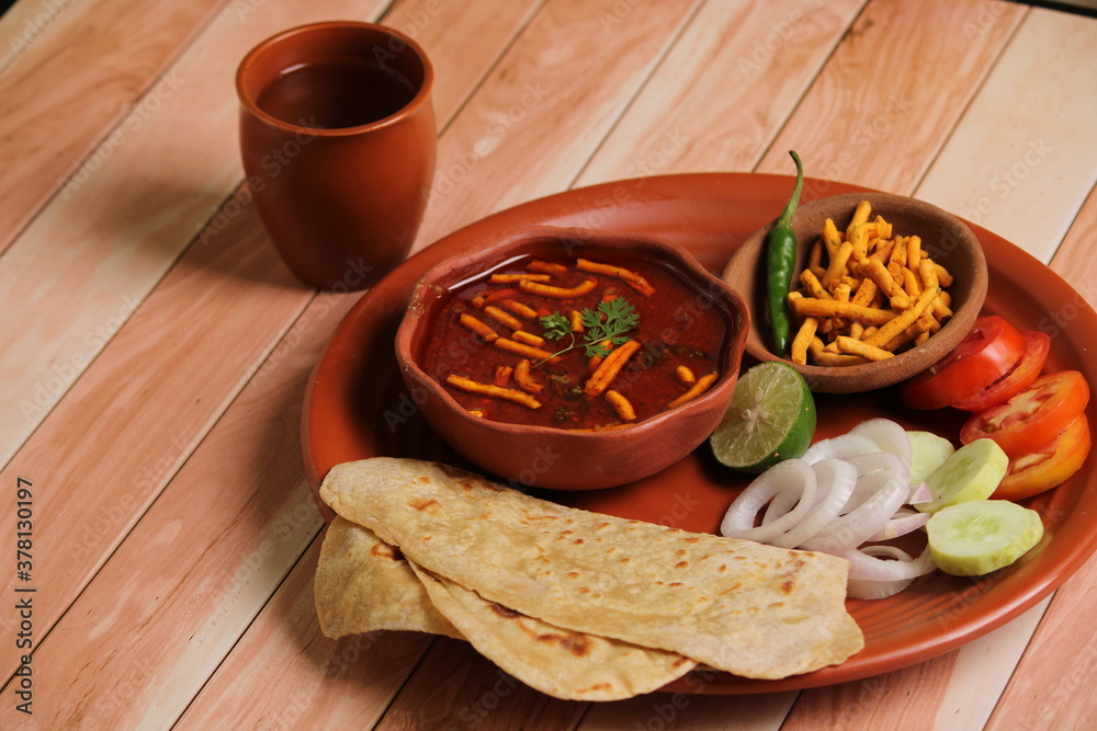 Dhaba style Sev bhaji/sabzi/curry made in tomato curry with gathiya ...