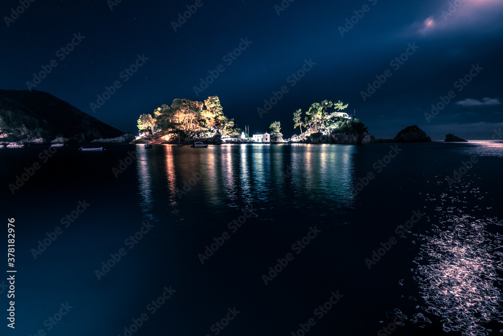 The small church on Panagias Island in Parga lights up the night ...