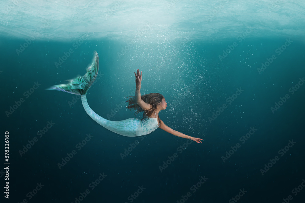 Underwater Mermaid Dancing Gracefully in the Ocean Stock Photo | Adobe ...
