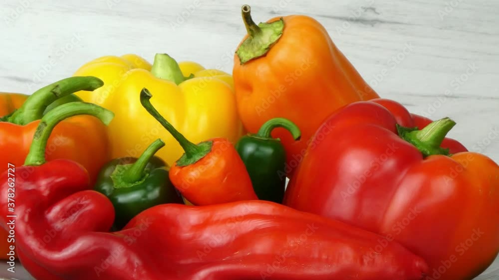 Beautiful close up overview of different peppers in various shapes ...
