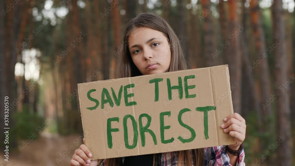 Teenage girl with Save the Forest poster. Young activist holding ...