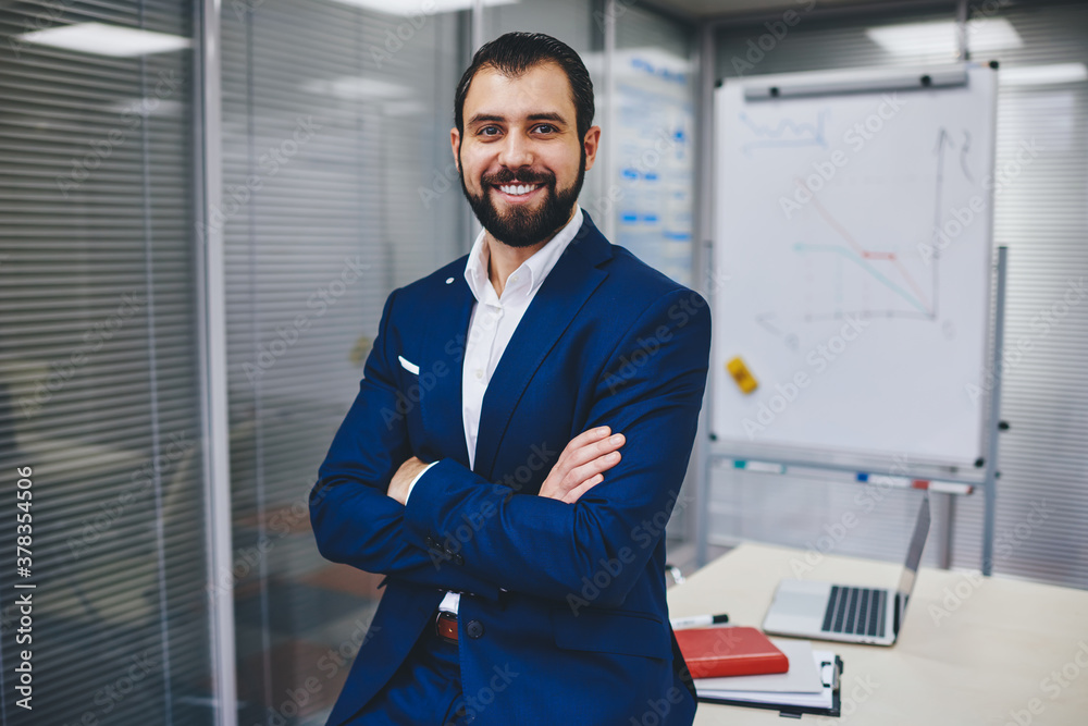 Half length portrait of successful male boss dressed in elegant suit ...