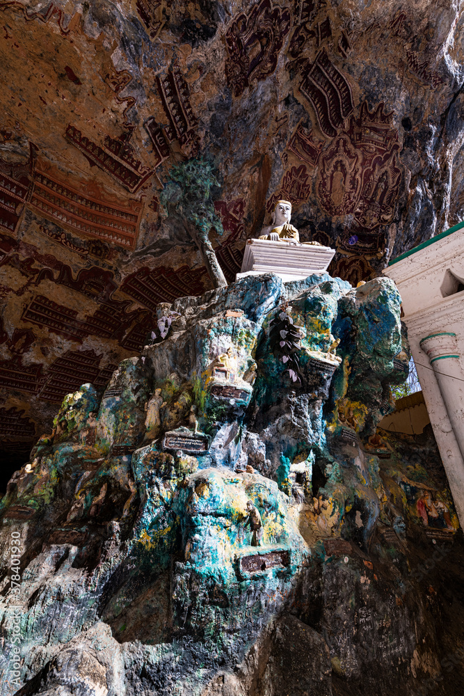 Myanmar, Kayin State, Hpa-an, Buddha statue and ancient carvings inside ...