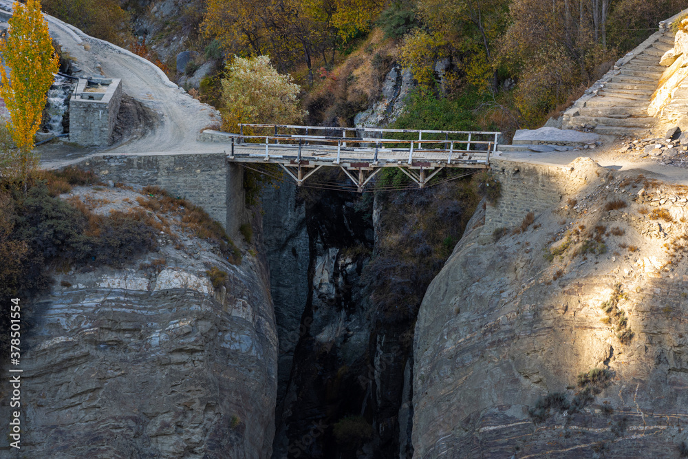 bridge in the mountains, landscape of northern areas of gilgit ...
