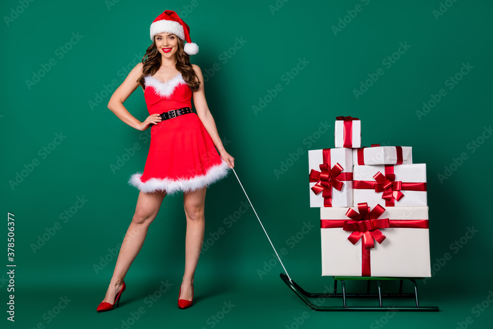 Full size photo pretty lovely fancy girl santa claus cap enjoy deliver ...