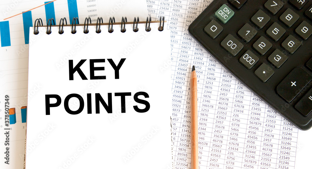 Paper plate with text KEY POINTs. Diagram, calculator, notepad and ...