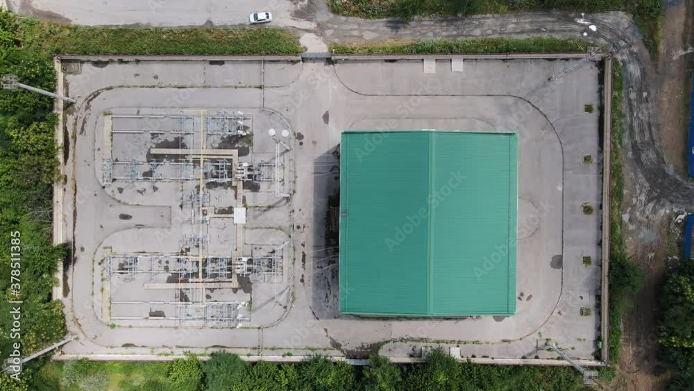 Aerial top view electric substation industry with green roof, View from ...