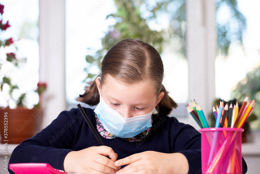 Children with face mask back at school after covid-19 quarantine and ...