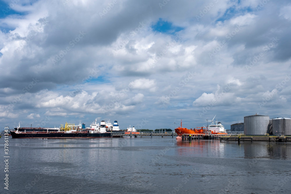 Tanker and oil storage tanks in Rotterdam, Netherlands. The port is the ...
