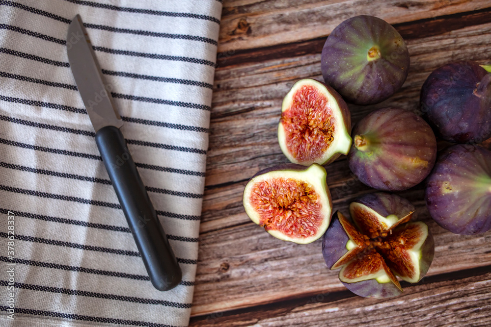 Fresh ripe figs on table background. Healthy Mediterranean fig fruit ...