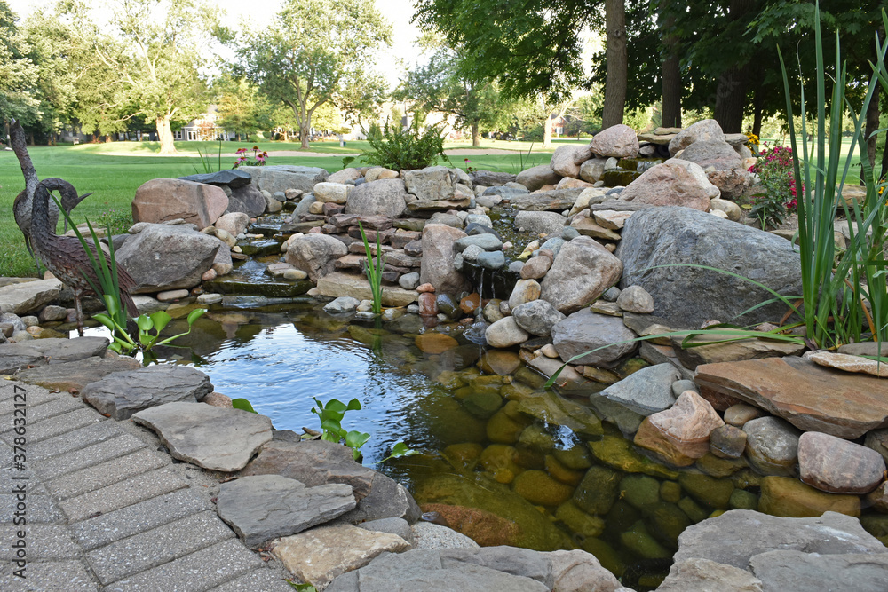 Finished backyard water feature constructed by the homeowner as a DIY ...