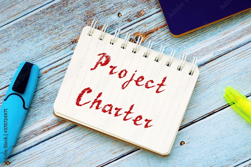 Project Charter sign on the sheet. Stock Photo | Adobe Stock