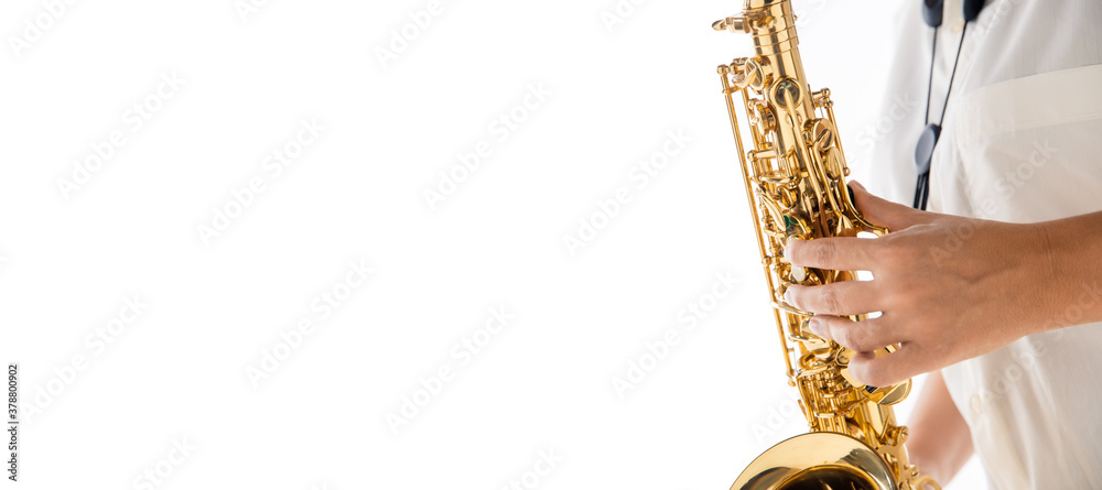 Poster Close up woman playing saxophone isolated on white studio ...