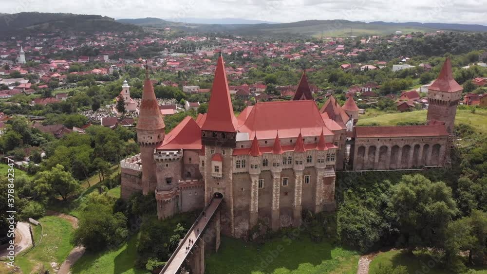 Dramatic aerial of Castelul Corvinilor, Corvin Castle. A beautiful ...