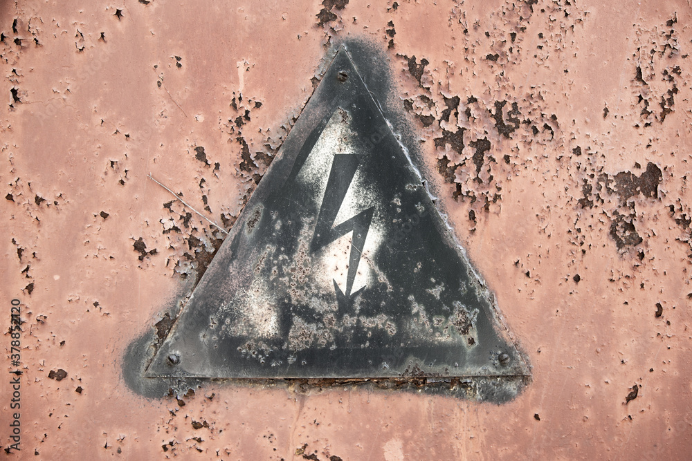 vintage weathered high voltage warning danger sign with lightning on ...