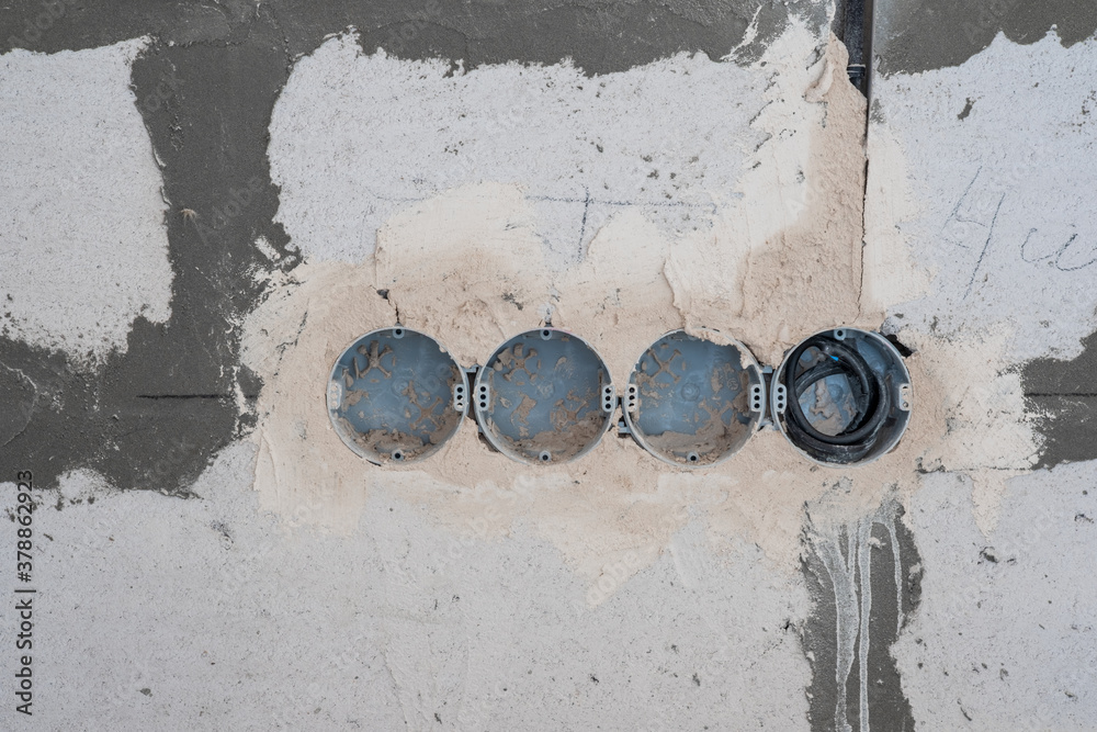 World standards set. wires outlet and connectors conduit on wall for ...