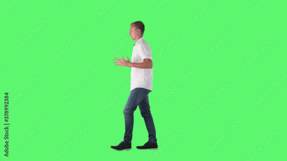 Side view of angry business man yelling and threatening while walking ...