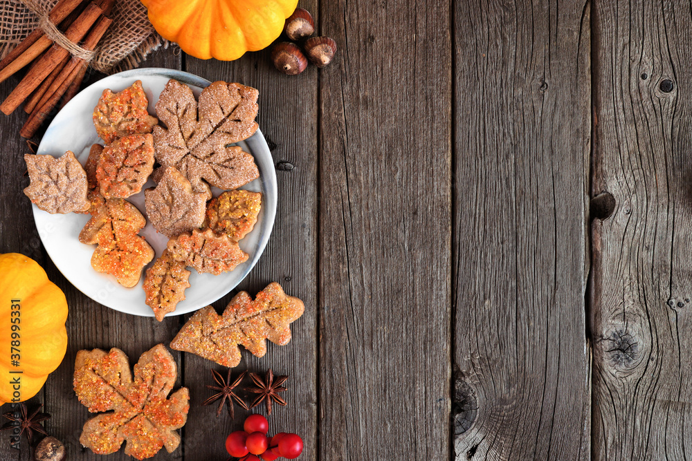Autumn leaf sugar cookies. Top view side border on a rustic wood ...