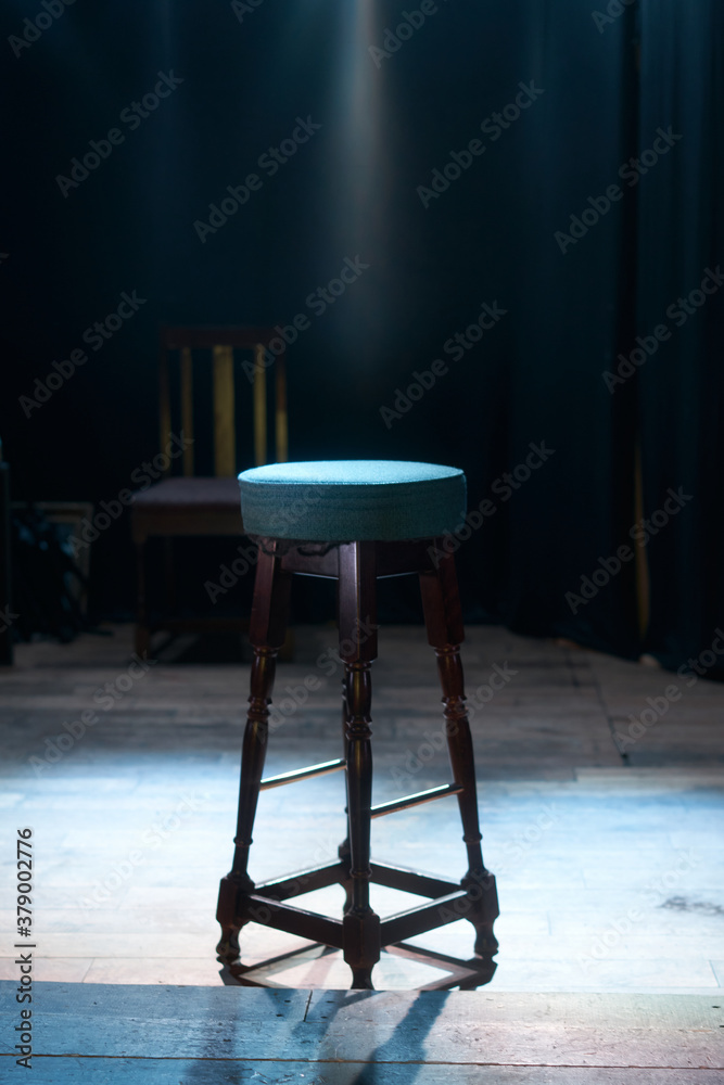 wooden high bar stool on a wooden stage Stock Photo | Adobe Stock