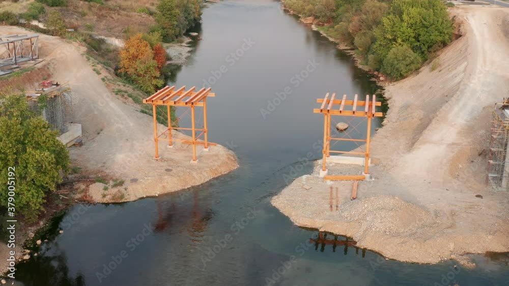 Bridge construction: metal scaffolding used as temporary support for ...