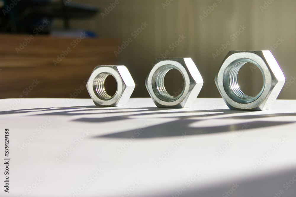 Fotografia do Stock: View of the metal nuts. A nut is a type of ...