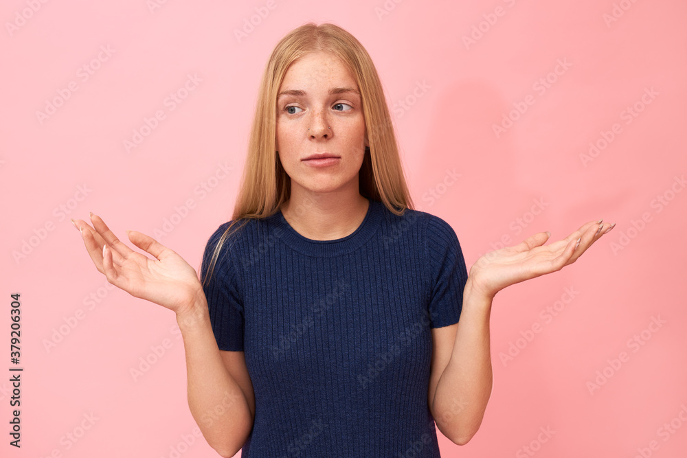 Portrait of confused perplexed cute young female being at loss for ...