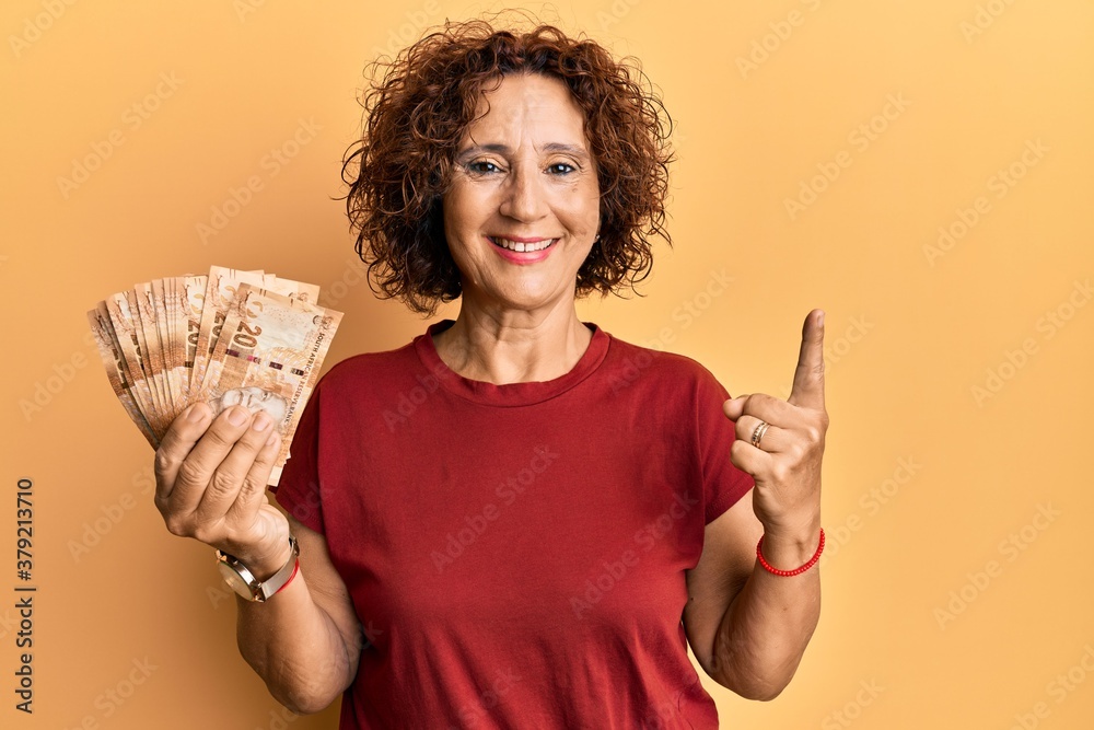Beautiful Middle Age Mature Woman Holding South African 20 Rand