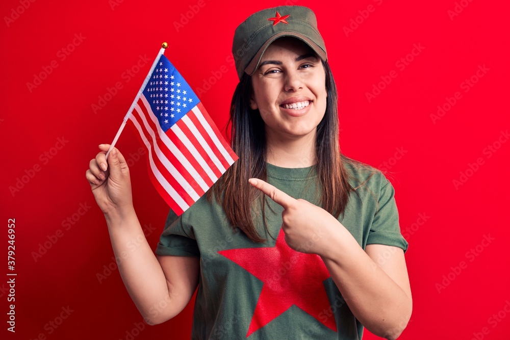 Foto de Beautiful woman wearing t-shirt with red star communist symbol ...