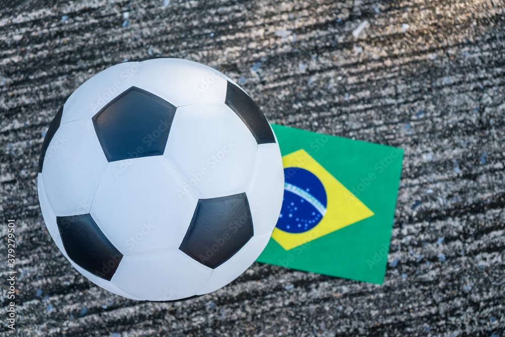 Above view of leather soccer ball with Brazil national flag of the ...