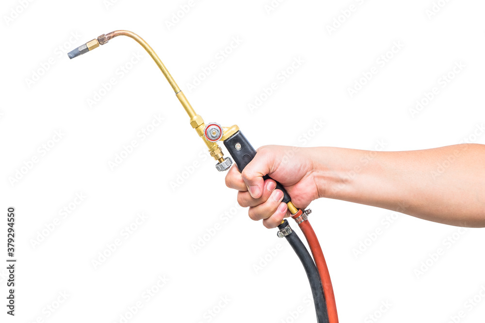 Hand holding welding gas cutting head brass tool isolated on white ...