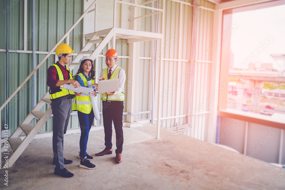 Three Building contractor, Engineer and construction worker is ...