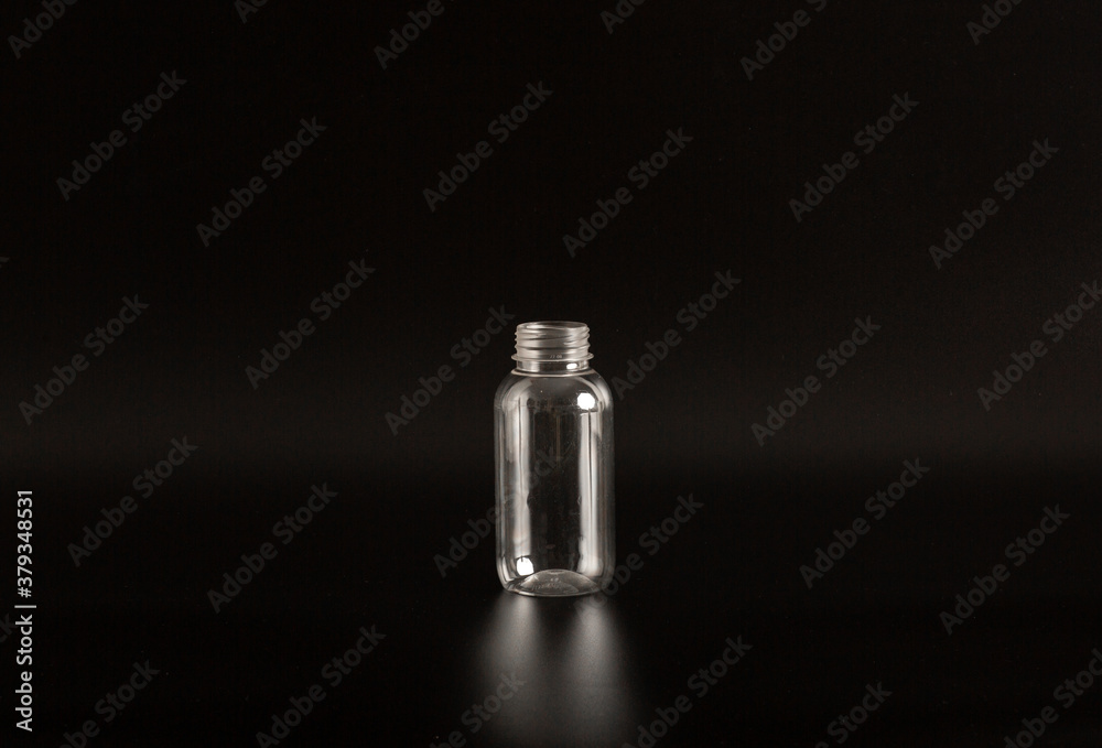 Clean white and transparent plastic container of different sizes on a ...